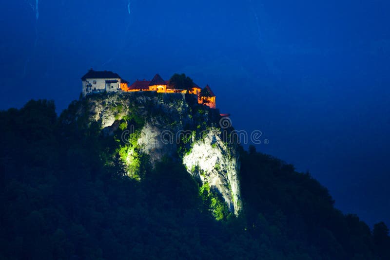 Bled castle cliff at night stock photo. Image of fort - 36024794
