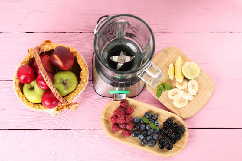 Blender and Fresh Ingredients on Pink Wooden Table, Top View Stock ...