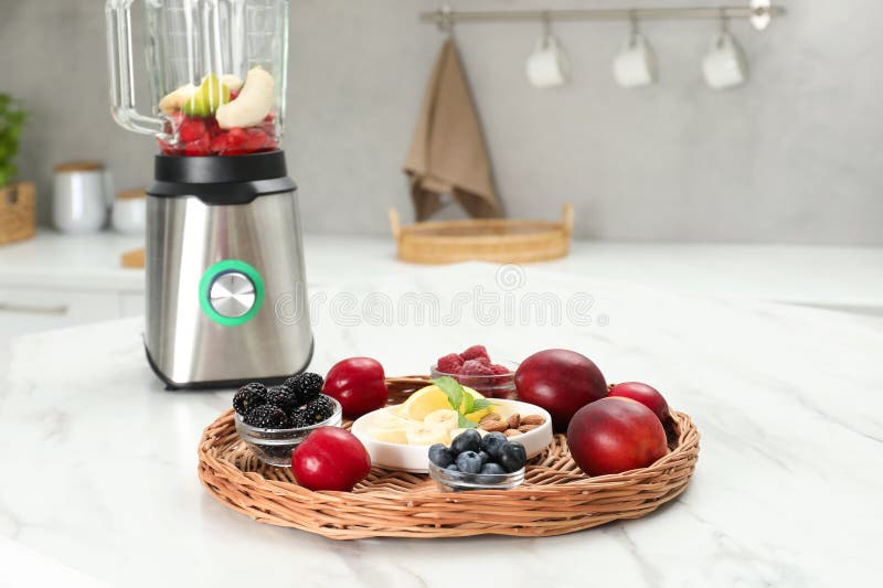 Blender and Fresh Ingredients on White Marble Table in Kitchen Stock ...