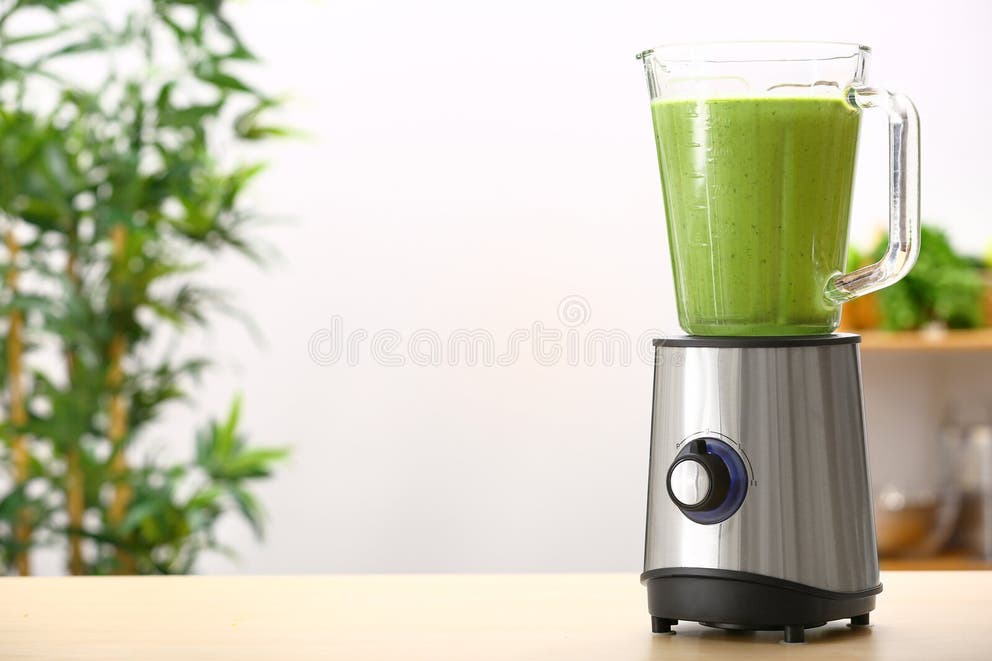 Blender with Healthy Smoothie on Table in Kitchen Stock Photo - Image ...