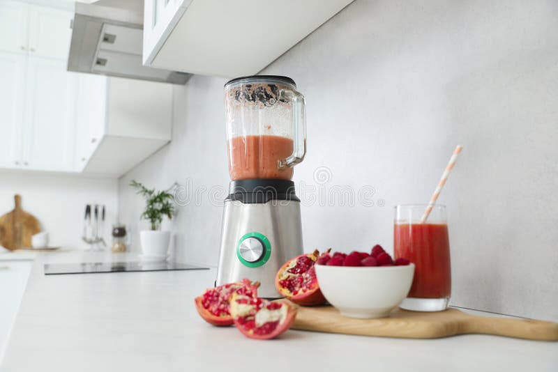 Blender and Smoothie Ingredients on White Countertop in Kitchen. Space ...
