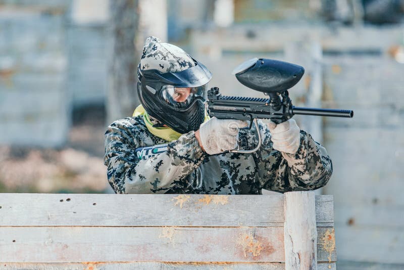 Blending in: a Camouflaged Warrior Engaged in Paintball Combat ...