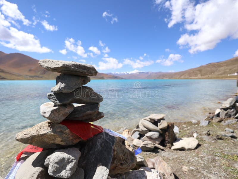 Blessed Stone in Sacred Lake Stock Photo - Image of lake, sacred: 169856120