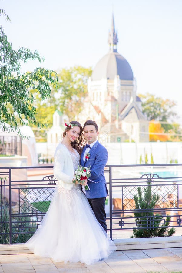 Blessed Wedding Couple Pose on the Bridge before Old Cathedral Stock ...