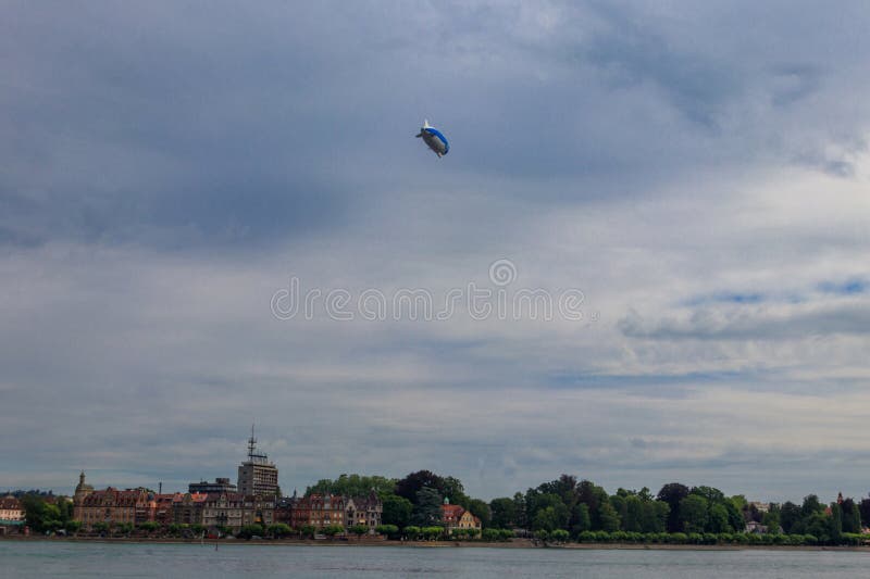 Blimp, Airship or Dirigible Flying in Sky Stock Photo - Image of ...