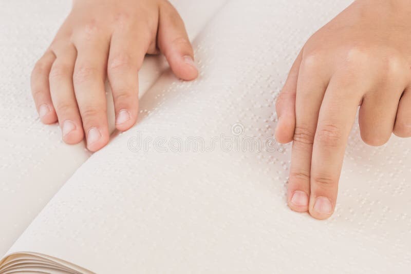 The Blind Boy is Reading a Book Written on Braille. Stock Photo - Image ...