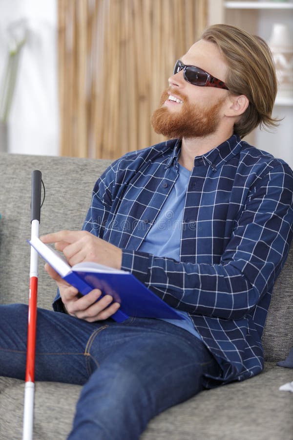 Blind Man Reading Braille Book on Sofa Stock Image - Image of script ...