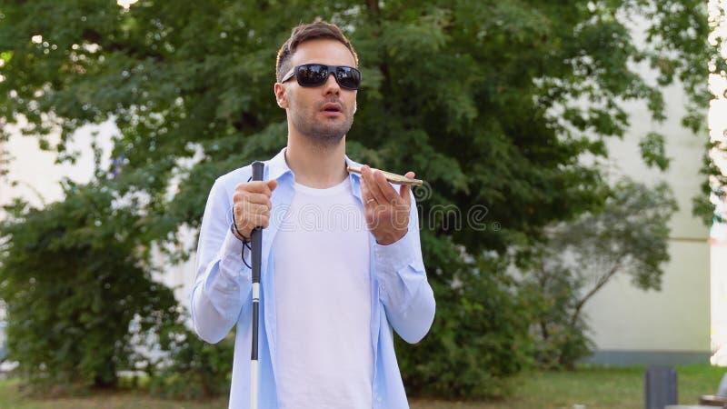Blind Man Using Voice Control App in Smartphone, Innovations Stock ...