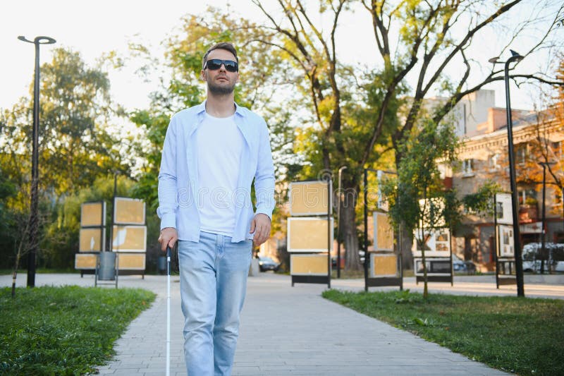 Blind Man Walking on Sidewalk Holding Stick. Stock Image - Image of ...
