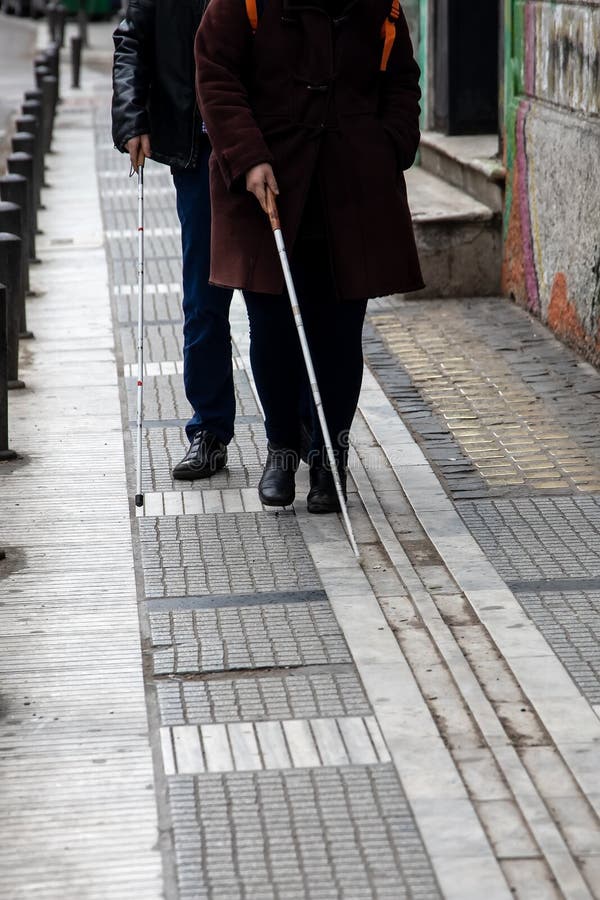 Blind Man and Woman Walking on the Street Stock Photo - Image of human ...