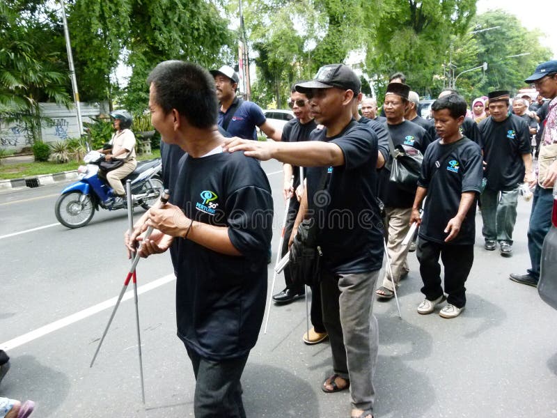 Blind people editorial photo. Image of people, solo, following - 65712406