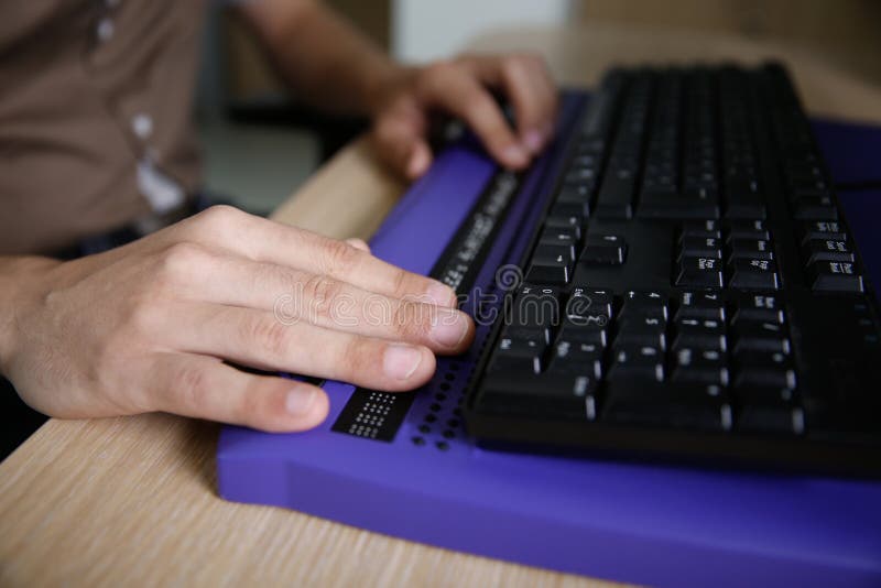 Blind Person Using Computer with Braille Computer Display Stock Image ...