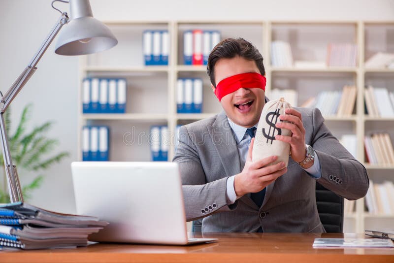 The Blindfold Businessman Sitting at Desk in Office Stock Photo - Image ...