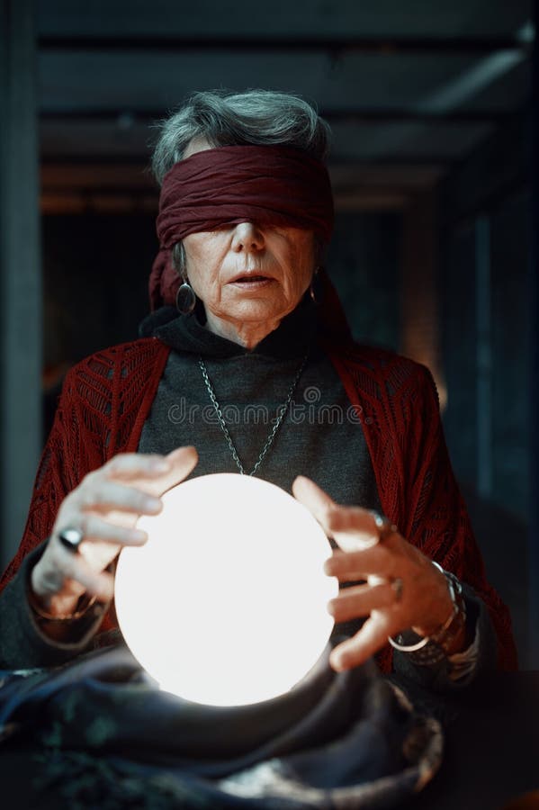 Blindfolded Witch Fortune Teller Doing Predictions with Illuminated ...