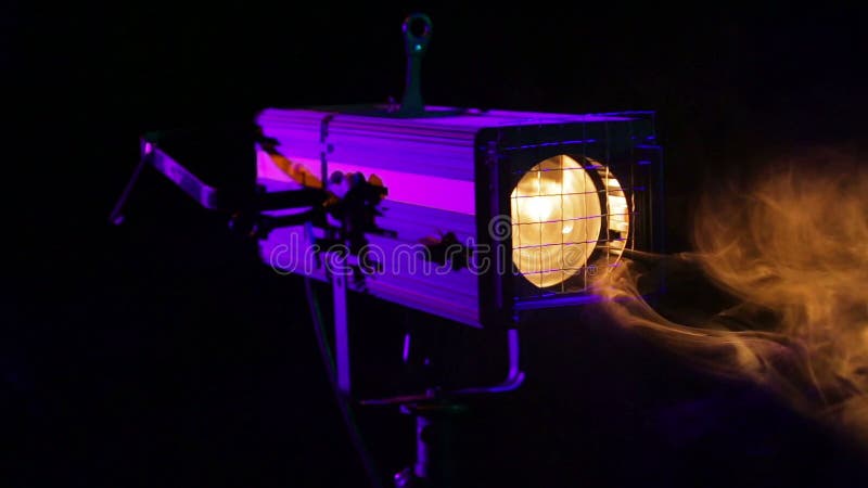 The Blinding Beam of a Rotating Theatrical Profile Spotlight in a Puff ...