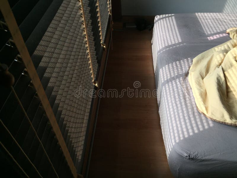 Blinds in a Home Catching the Sunlight with Burst Light with Shadow on ...