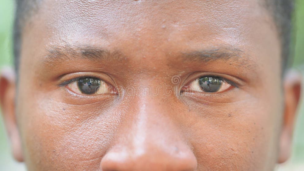 Blinking Eyes of Young African Man Stock Image - Image of eyes, looking ...