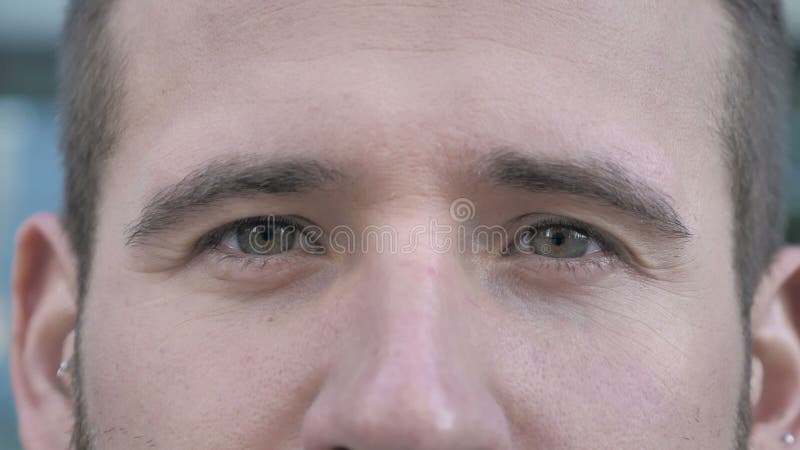 Blinking Eyes of Young Man stock video. Video of office - 126767771