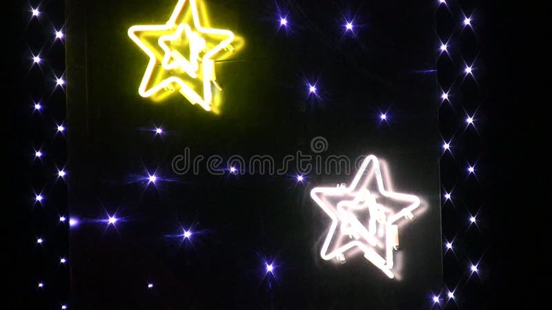 Blinking Neon Stars Shape Lights on Stock Footage - Video of focus ...