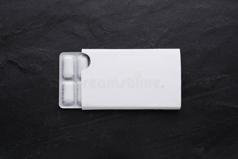Blister with Chewing Gums on Black Table, Top View Stock Photo - Image ...