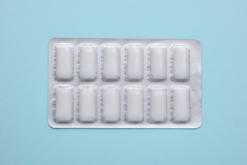 Blister with Chewing Gums on Light Blue Background, Top View Stock ...