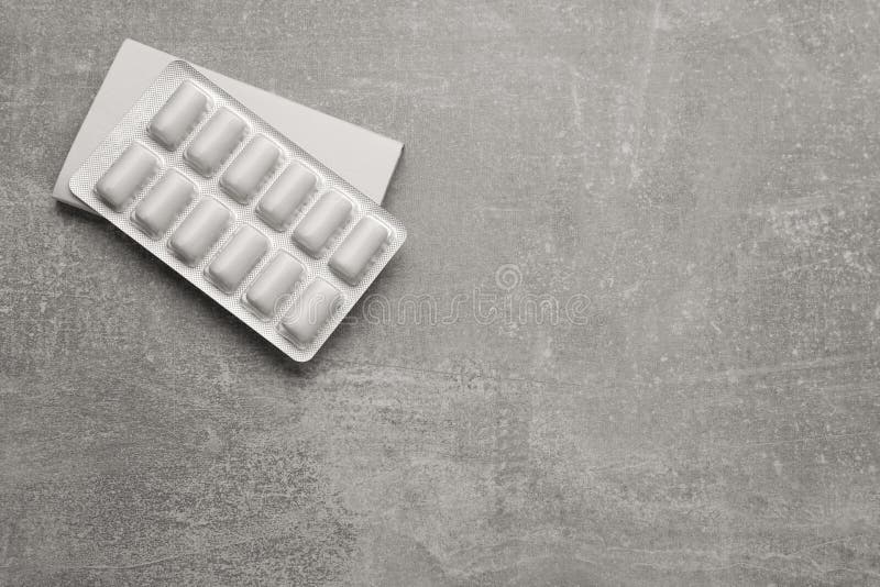 Blister with Chewing Gums on Light Grey Table, Top View. Space for Text ...