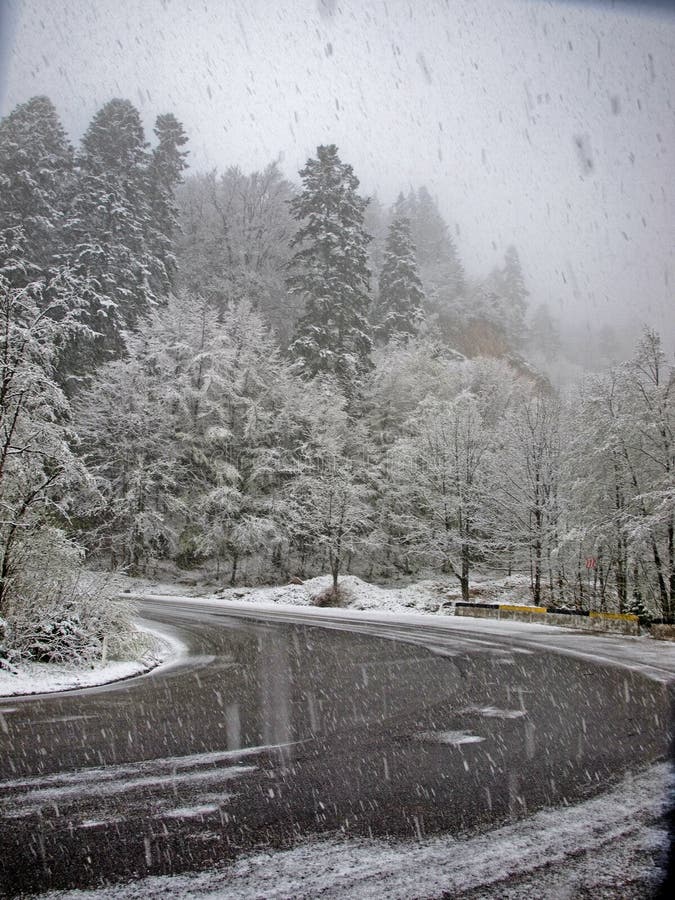 Heavy Snow Falling and a Mountain Road Stock Image - Image of landscape ...