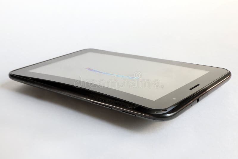 A Bloated Tablet on a Light Background. Stock Image - Image of phone ...