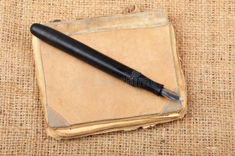 Bloc-notes Et Stylo De Vintage Photo stock - Image du matériel, agenda ...