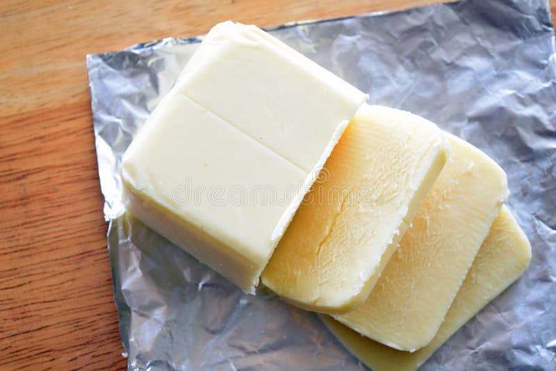Block of Cheese stock photo. Image of product, tasty - 136678526