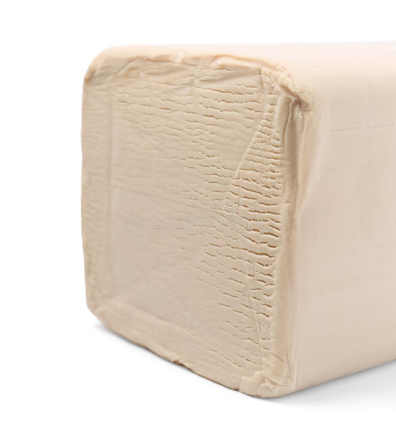 Block of Compressed Yeast Isolated on White, Closeup Stock Photo ...