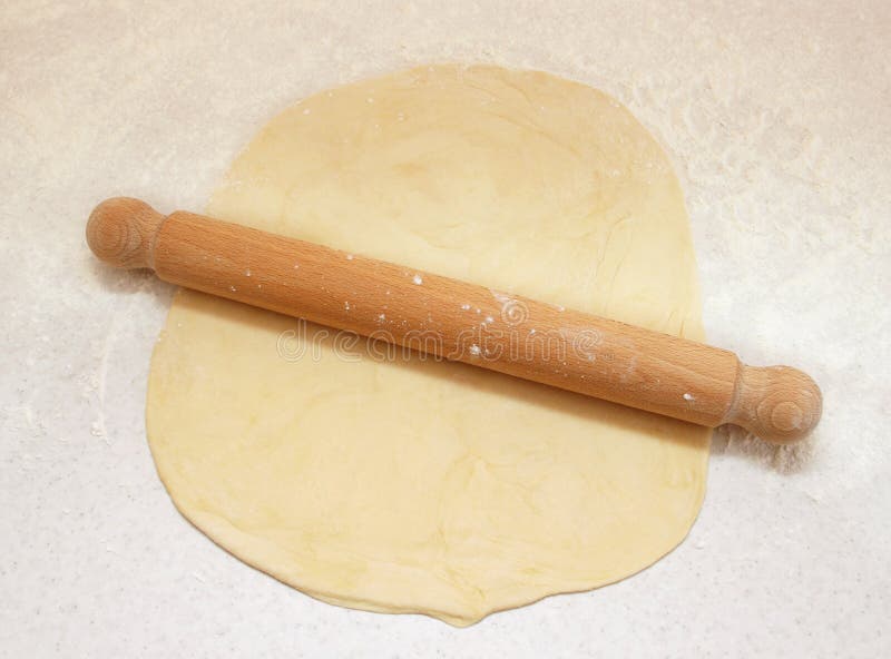Block of Freshly Made Pastry Rolled Out on a Floured Work Surface Stock ...