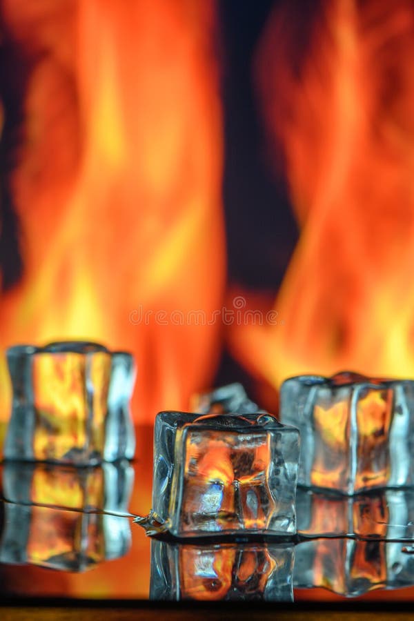 Block of Ice on Fire 3 stock photo. Image of warm, refreshing - 322978624