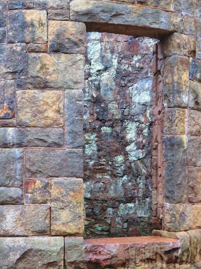 Rock dam ruin with window stock photo. Image of brown - 192039998