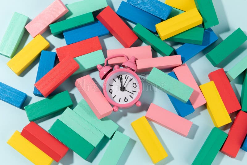 Block Tower Made of Colourfull Wooden Blocks and a Clock Stock Image ...