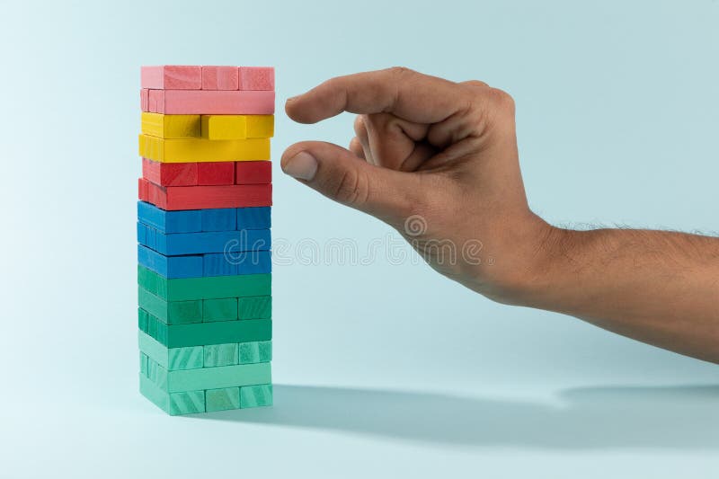 Block Tower Made of Colourfull Wooden Blocks on Light Blue Background ...