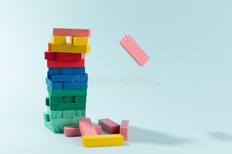 Block Tower Made of Colourfull Wooden Blocks on Light Blue Background ...