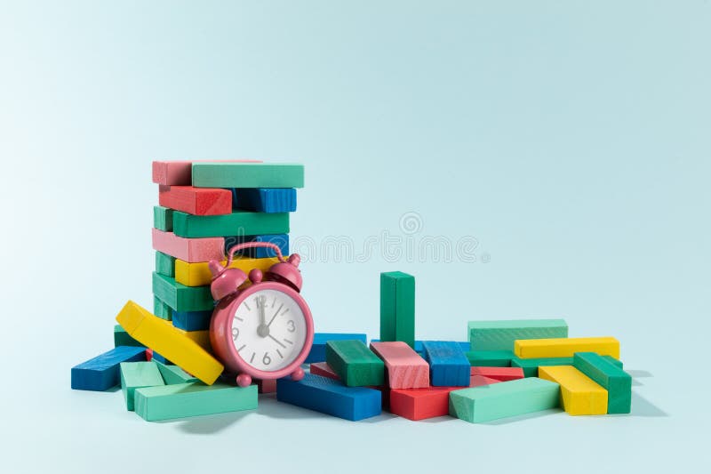 Block Tower Made of Colourfull Wooden Blocks on Light Blue Background ...