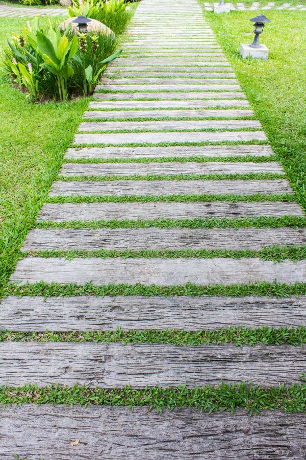 Block Walk Path in the Garden with Green Grass Stock Photo - Image of ...
