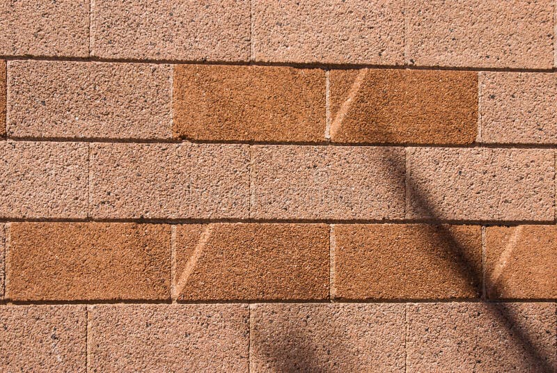 Block wall with V shapes stock image. Image of orange - 66175277