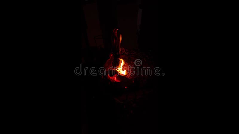 Block of Wood Burning in Red Flames in the Dark Background. Stock Video ...