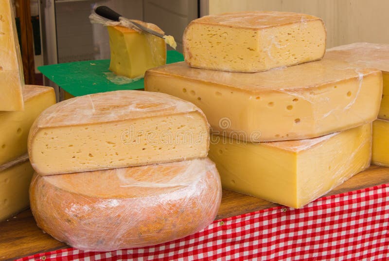 Blocks of Fresh Yellow Cheese for Sale on Stall Stock Photo - Image of ...