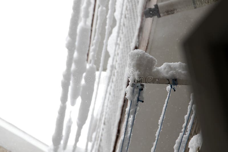 Blocks of Snow on Top of Clothesline Stock Image - Image of covered ...