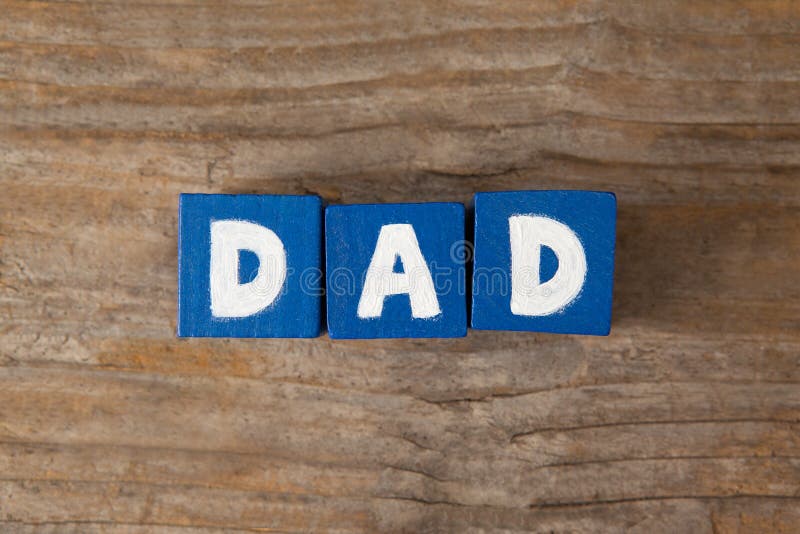 Blocks with Text Dad on Wooden Plank Stock Image - Image of event ...