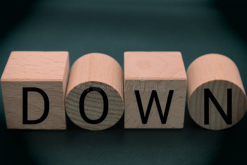 Blocks written DOWN stock photo. Image of sell, business - 286937256