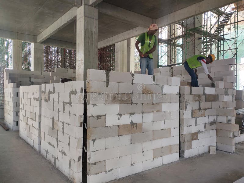 Blockwork by Construction Workers at the Construction Site. Editorial ...