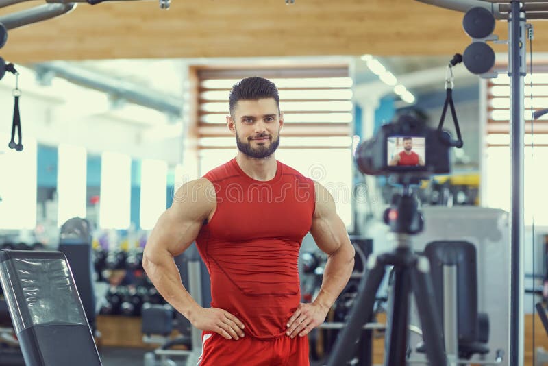 Blogger Athlete Bodybuilder Makes a Video in the Gym Stock Image ...