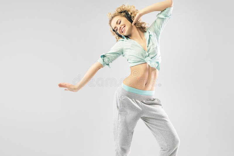 Blond Alluring Woman Dancing Alone Stock Photo - Image of athlete ...