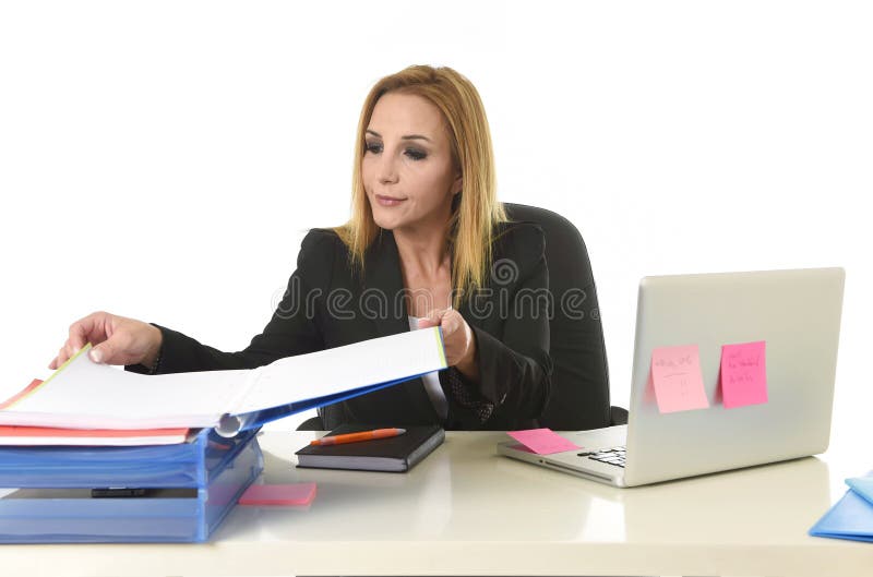 Blond Attractive 40s Woman In Business Suit Working At Laptop Computer