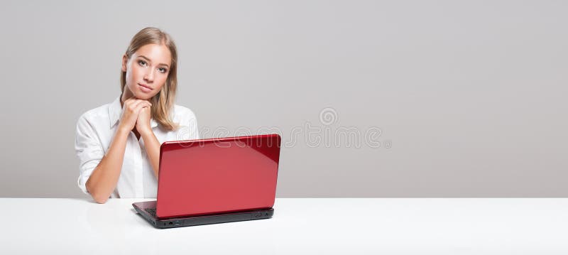 Blond beauty using laptop. stock photo. Image of person - 45295306
